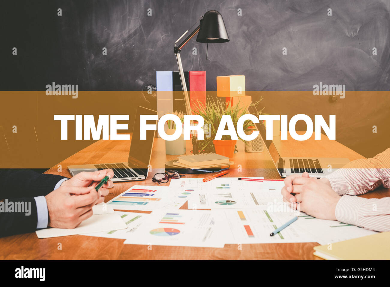 Two Businessman Time For Action working in an office Stock Photo - Alamy