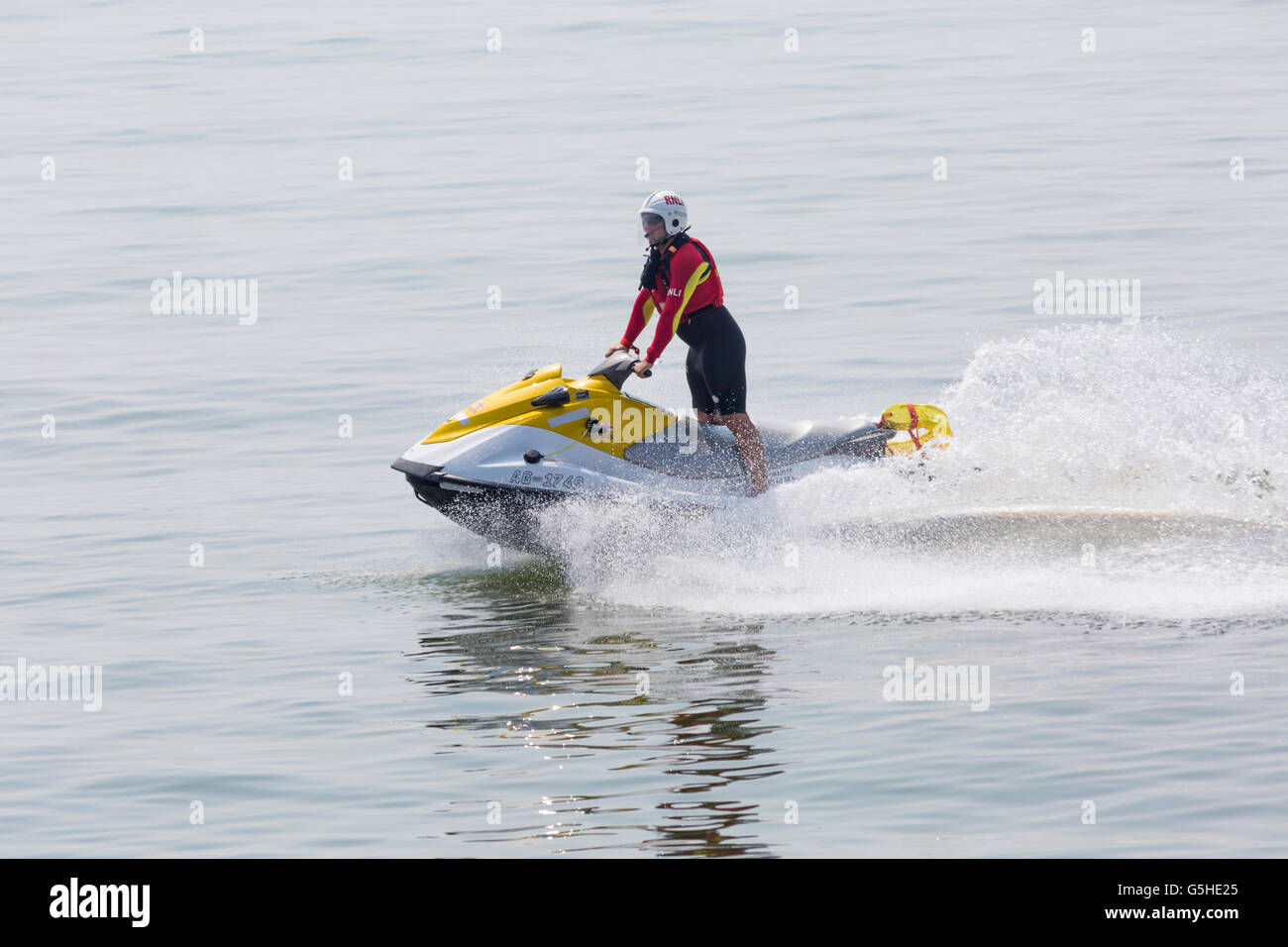 Lifeguard riding a jet ski hi-res stock photography and images - Alamy