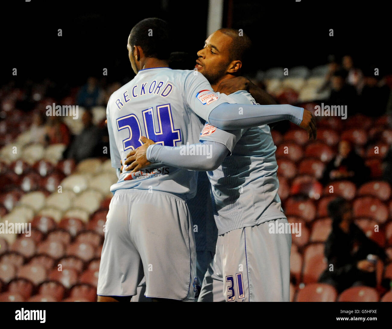 Coventry City's David McGoldrick (right) celebrates scoring their first ...