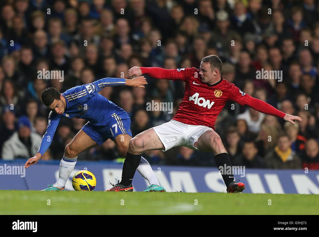 Chelsea's Eden Hazard (left) and Manchester United's Wayne Rooney ...