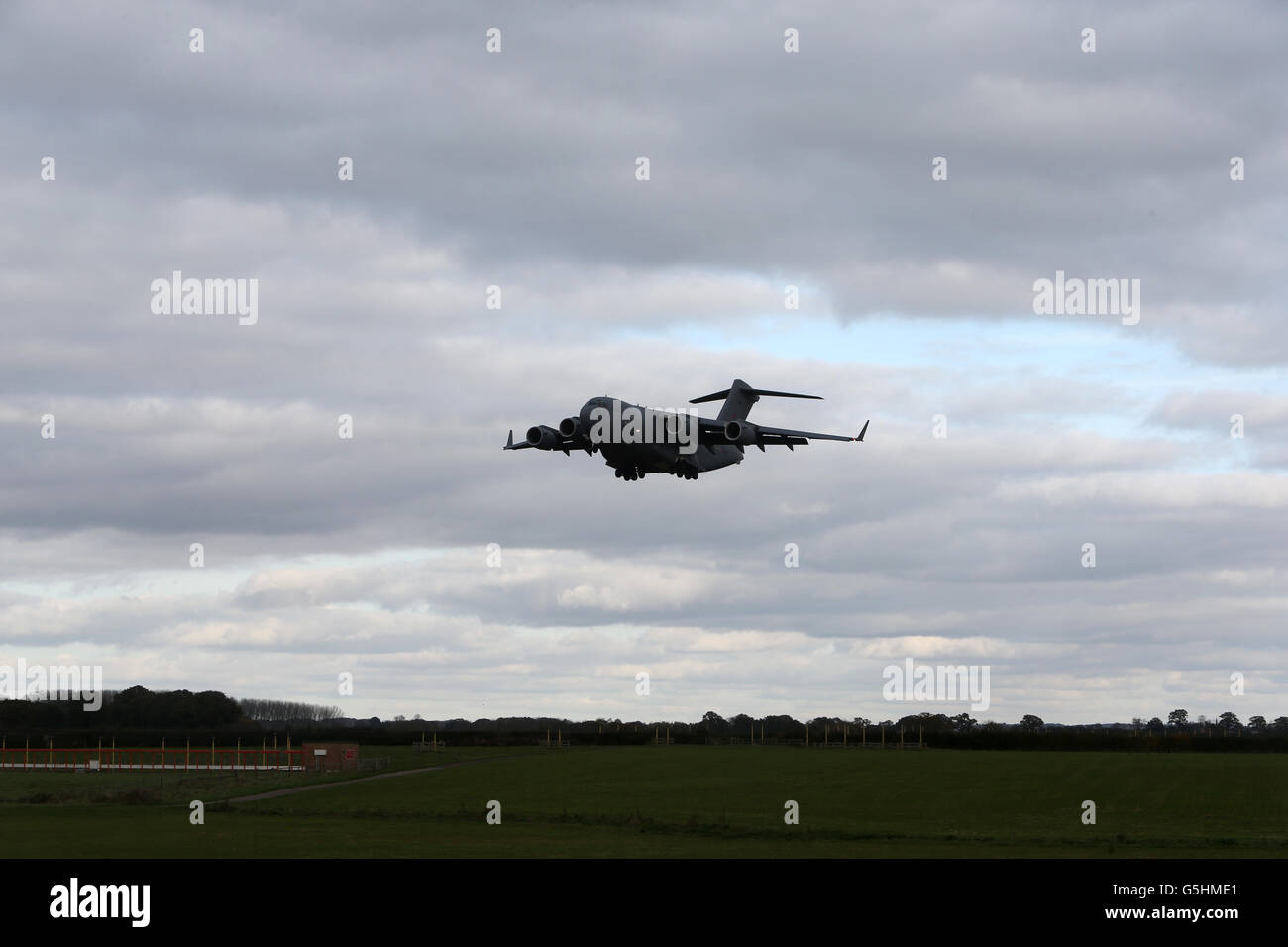 The plane carrying the bodies of Corporal David O'Connor from 40 ...