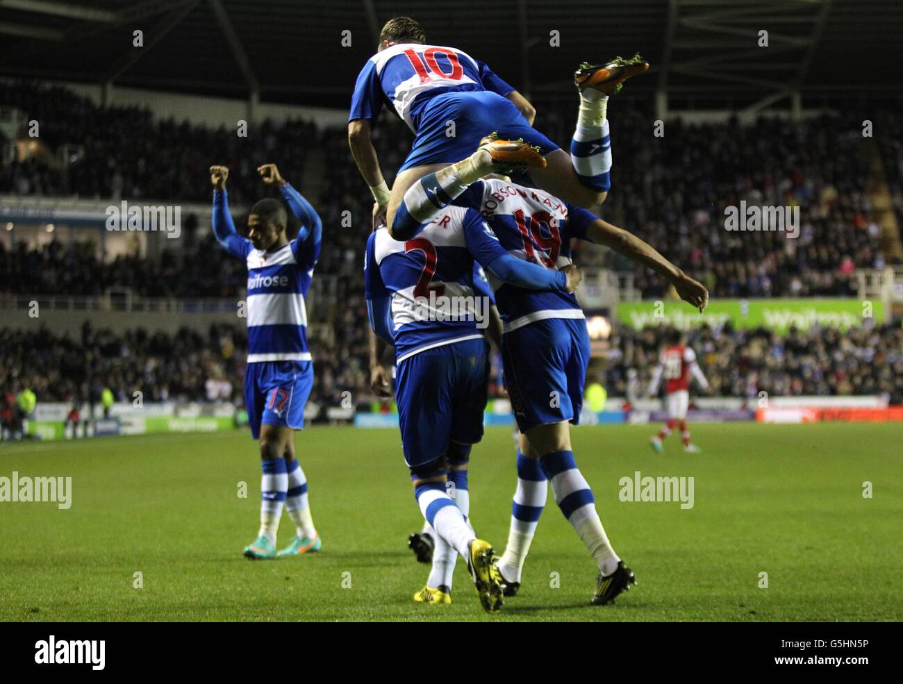 Reading's Chris Gunter (2) celebrates with teammates after Arsenal's ...