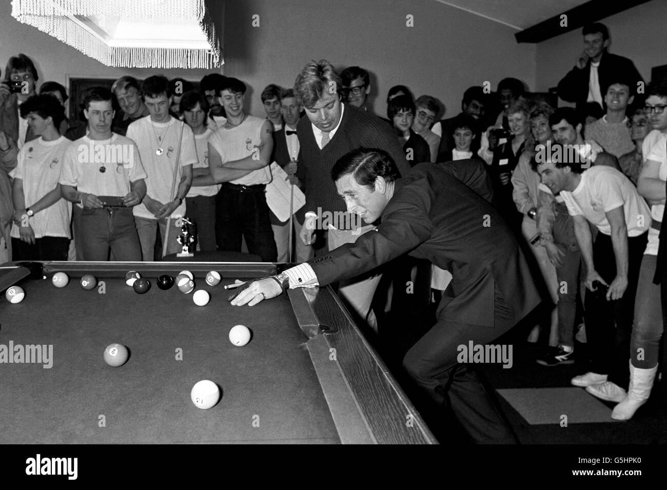 The Prince Wales playing pool on his visit to see a young unemployed ...
