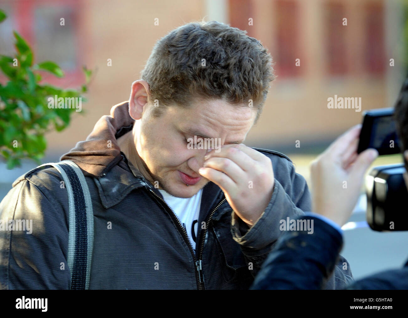 Kevin Ellis, friend of Karina Menzies, 32, is interviewed outside the ...