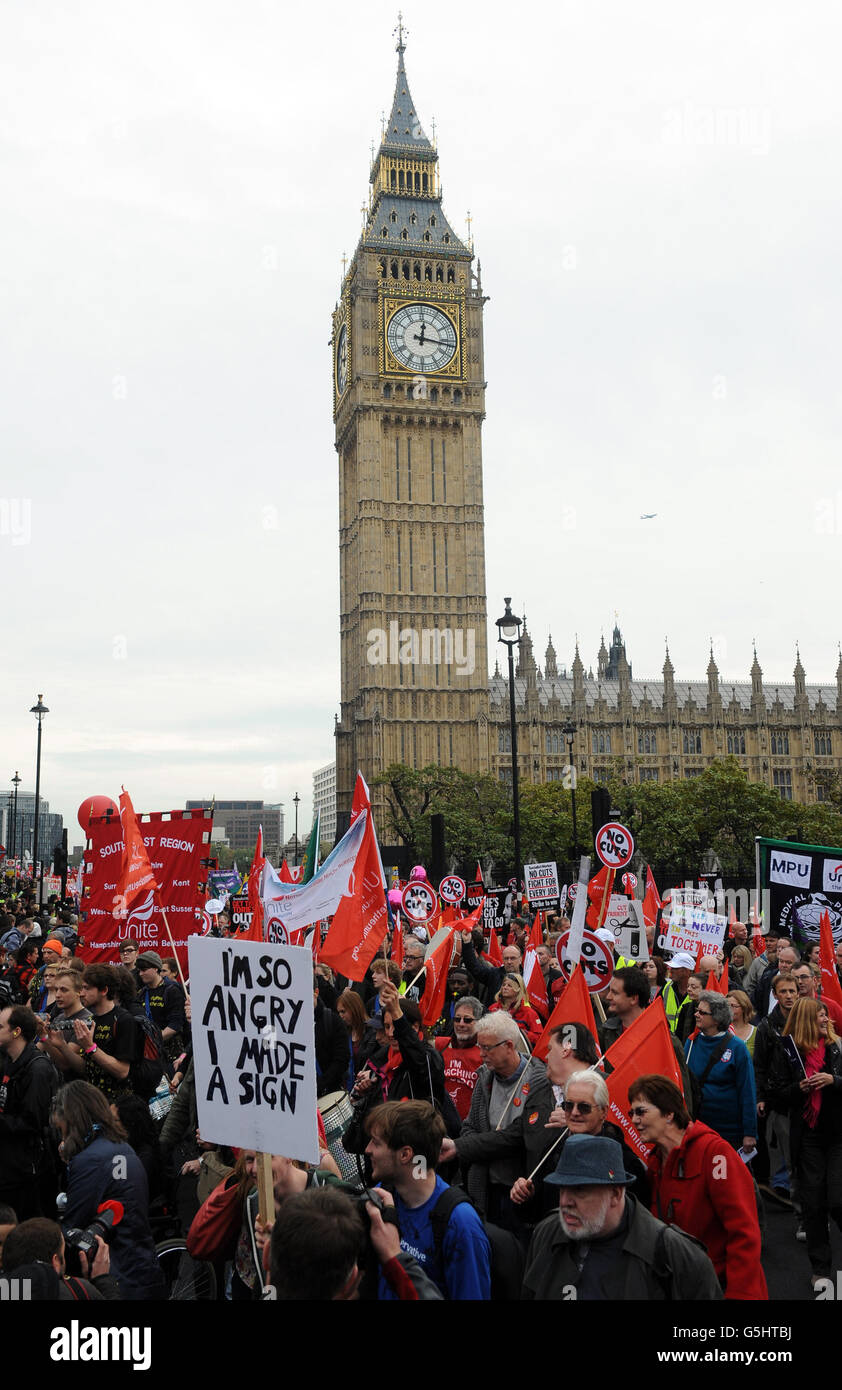 Demonstrators march past the Houses of Parliament during the TUC ...