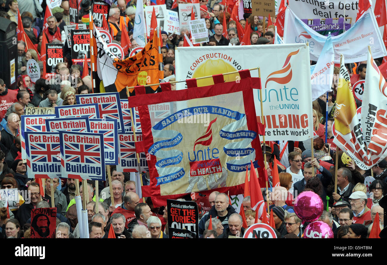 TUC march. Demonstrators carrying placards and banners during the TUC ...