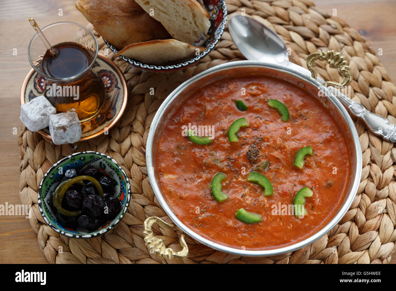 Menemen Turkish breakfast food egg, tomatoes and pepper in pan with ...