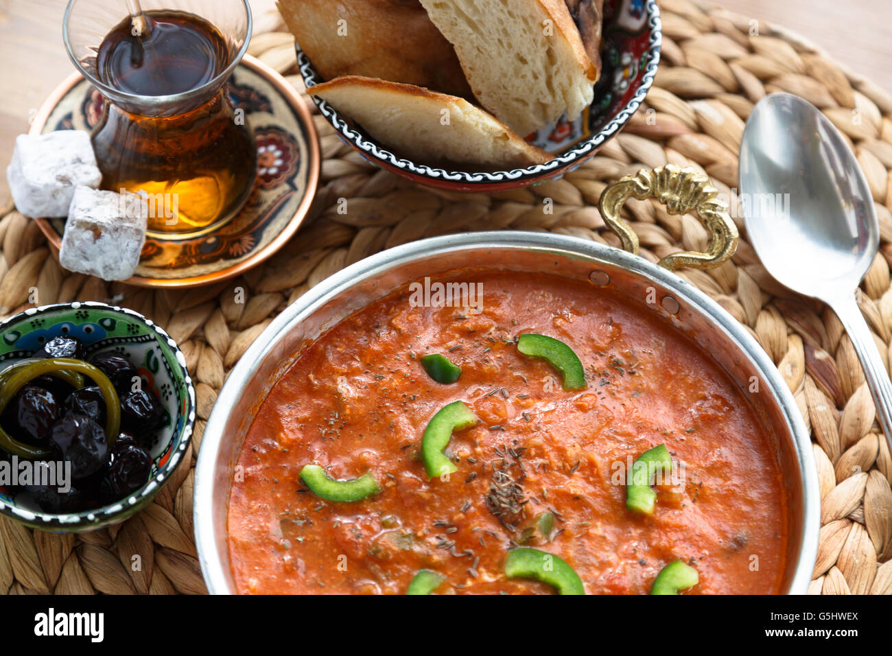 Menemen Turkish breakfast food egg, tomatoes and pepper in pan with ...
