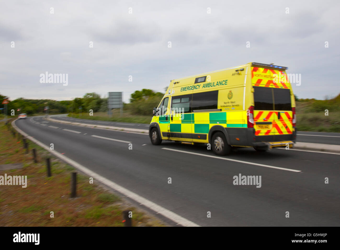 Speeding 999 Emergency NHS Ambulance responding to an incident on the ...