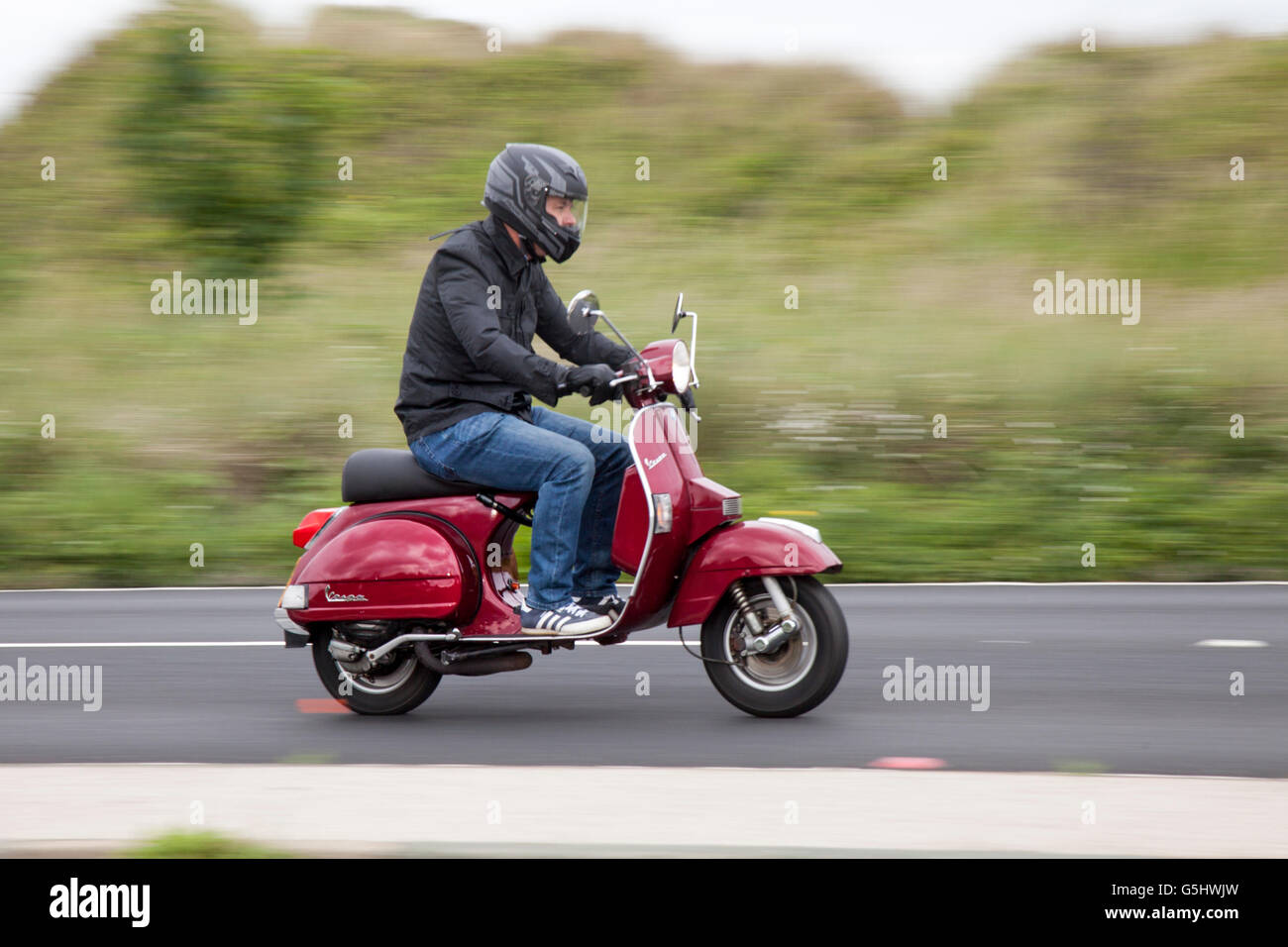 Vespa Scooter Rider en-route to Southport's beautiful Victoria Park, in ...