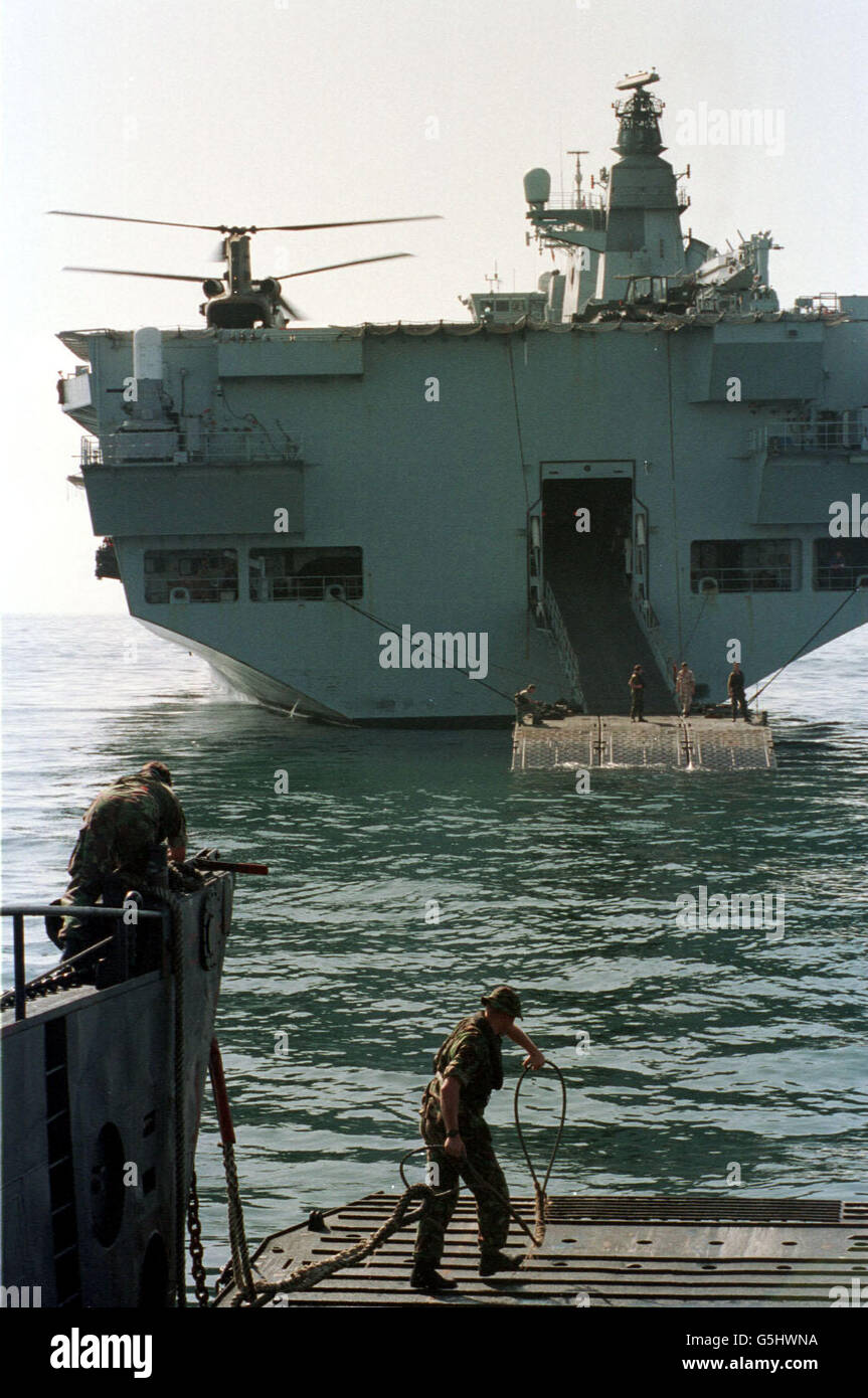Cpl Bell of 4 Assault Squadron, prepares the ropes from Foxtrot 3, a ...