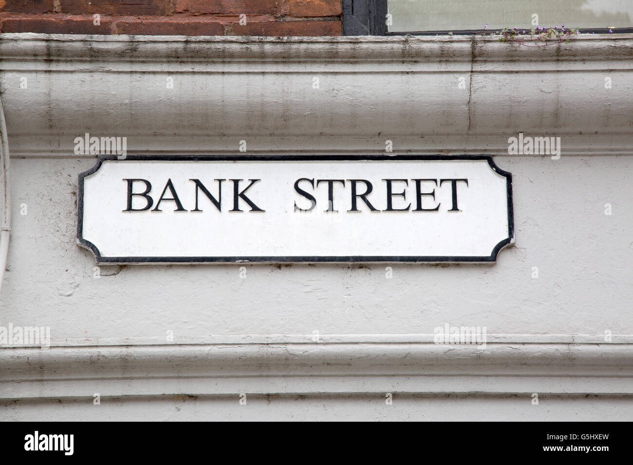 Bank Street on White and Brick Wall Stock Photo - Alamy