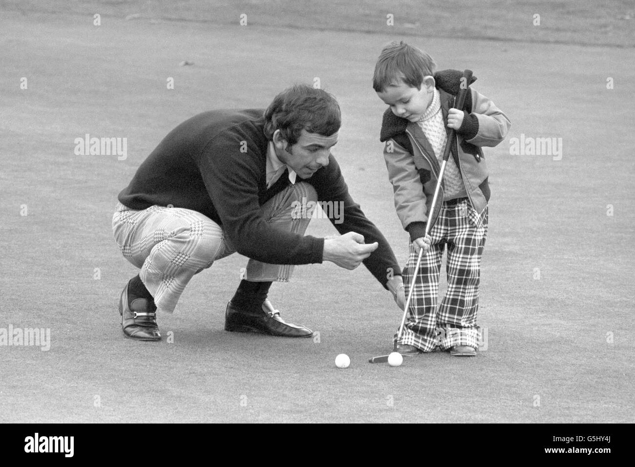 Putting in ball Black and White Stock Photos & Images - Alamy