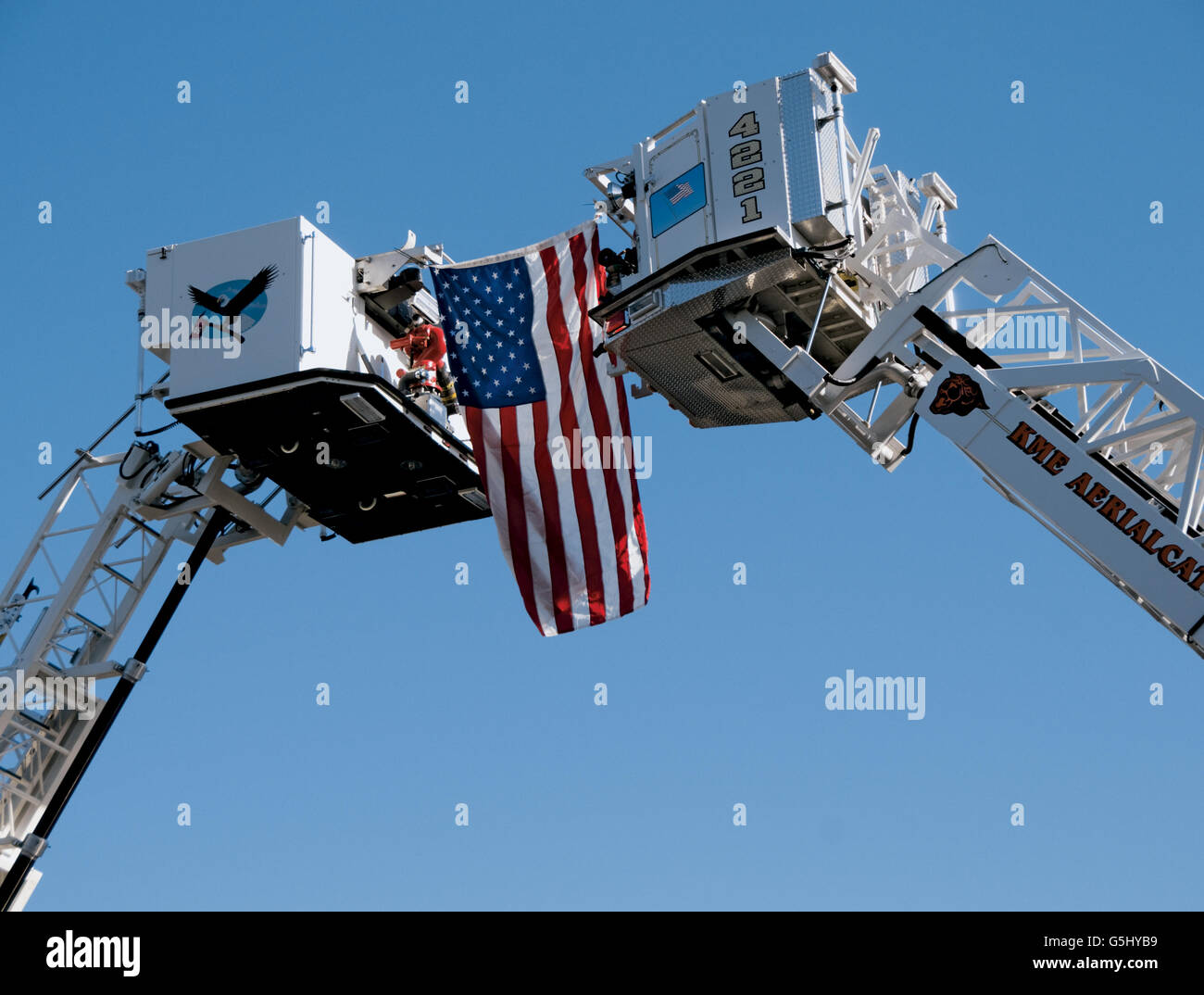Ladder Arch with Flag at Fireman's Funeral Stock Photo - Alamy