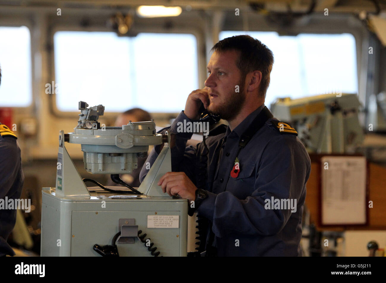 Royal Navy lieutenant Martin Shaw on the Bridge of HMS Bulwark during a ...