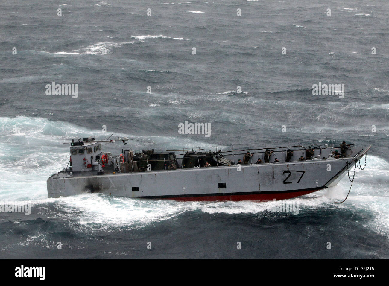 Royal Marines onboard a French landing craft during a joint naval ...