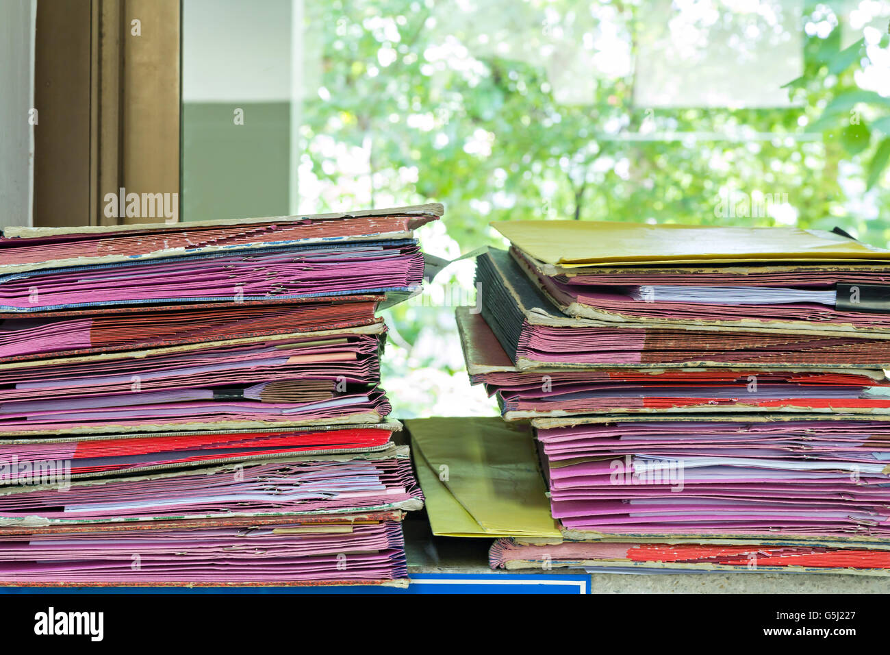 a lot of stack document folder hard work Stock Photo - Alamy