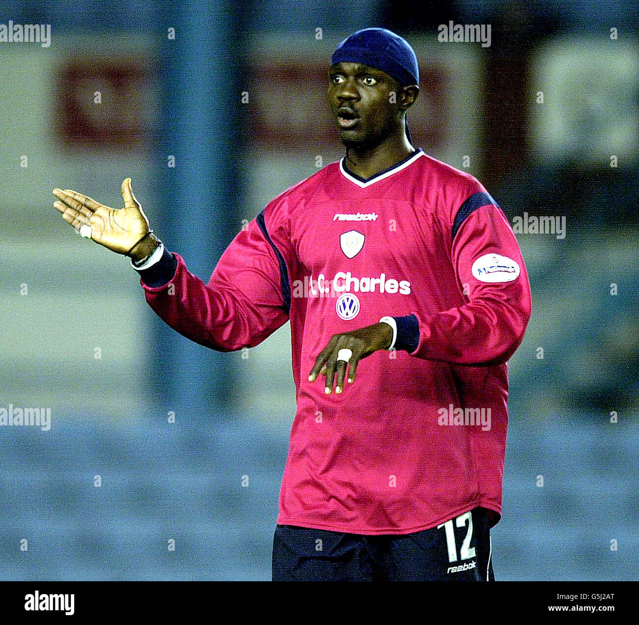 Sport football action hat hand out plaster hi-res stock photography and ...