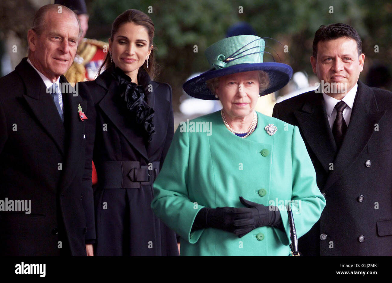 Britain's Queen Elizabeth II (2nd L) stands with King Abdullah of ...