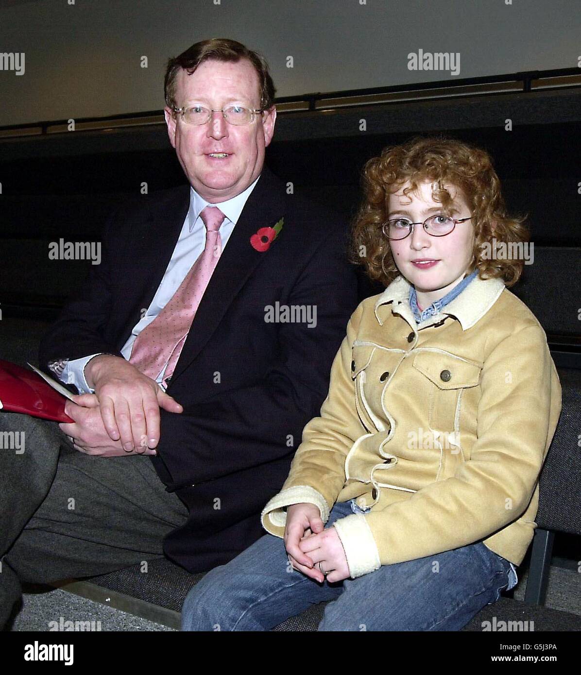 Northern Ireland's First Minister David Trimble and his nine year old ...