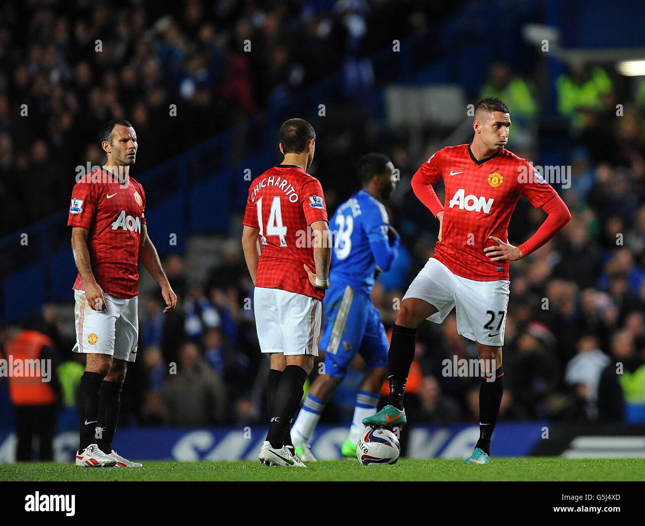 Manchester United's Federico Macheda and Javier Hernandez (centre ...