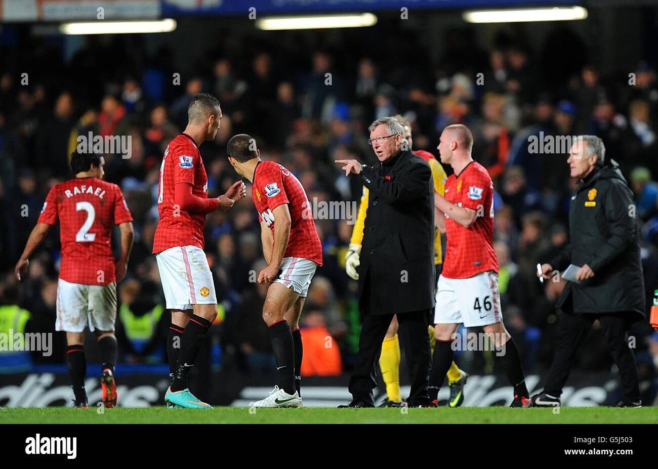 Manchester United's Federico Macheda (left) receives instructions from ...