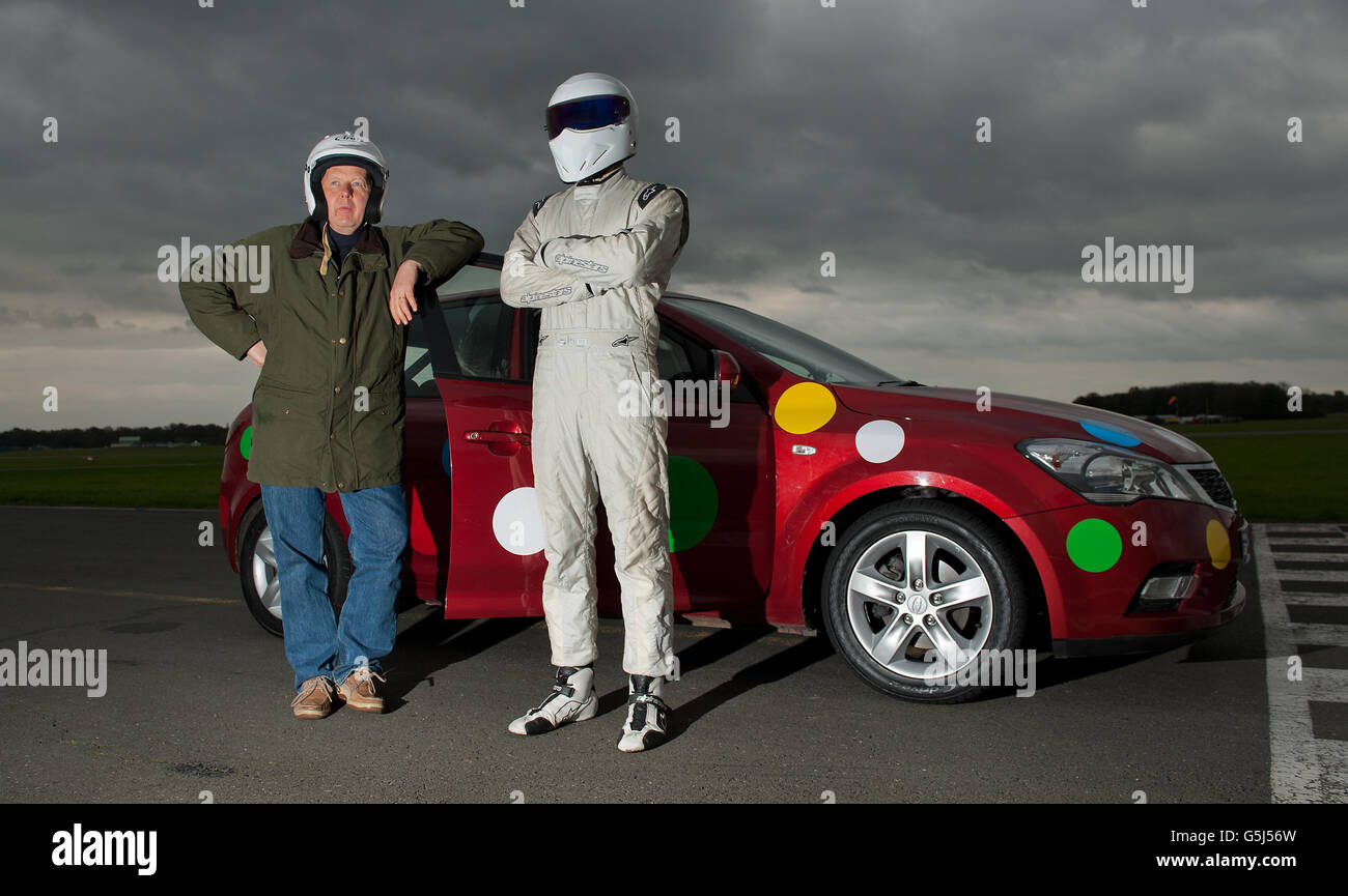 BBC Newsreader Bill Turnbull poses with The Stig before testing his ...