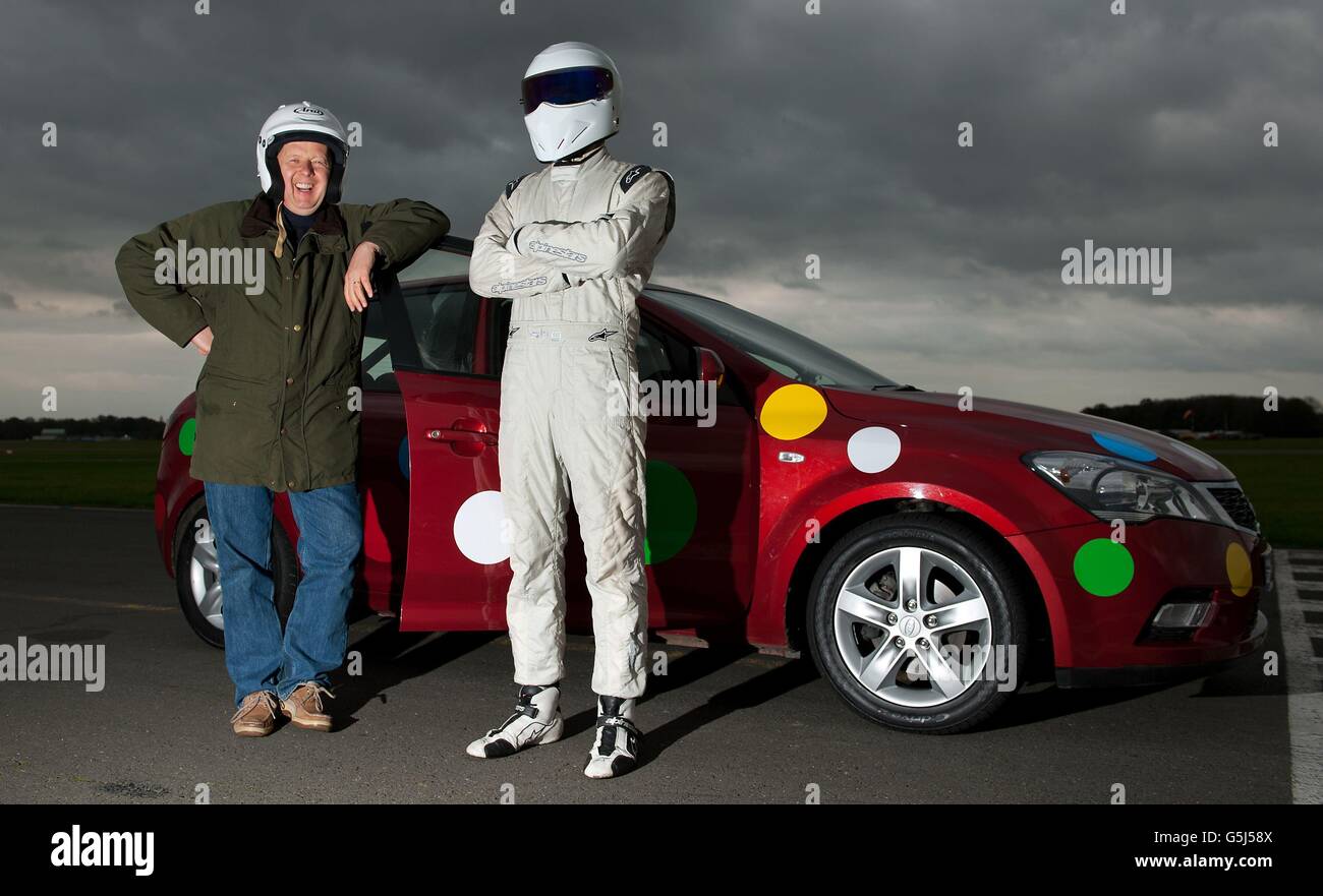 BBC Newsreader Bill Turnbull poses with The Stig before testing his ...