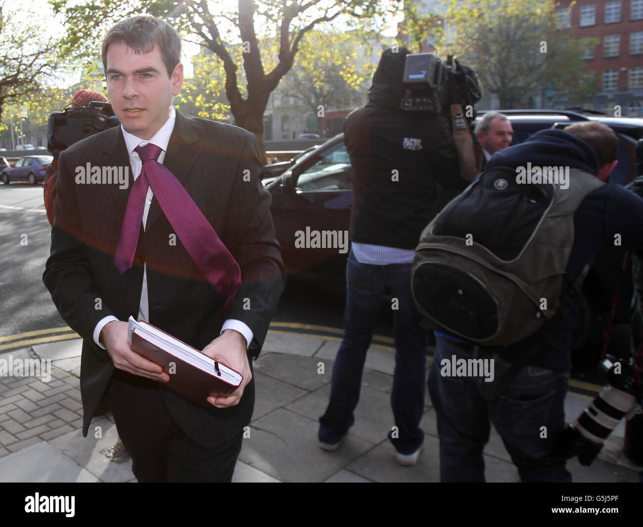 Sean Quinn Jnr arrives with his father Sean Quinn at the Supreme Court ...