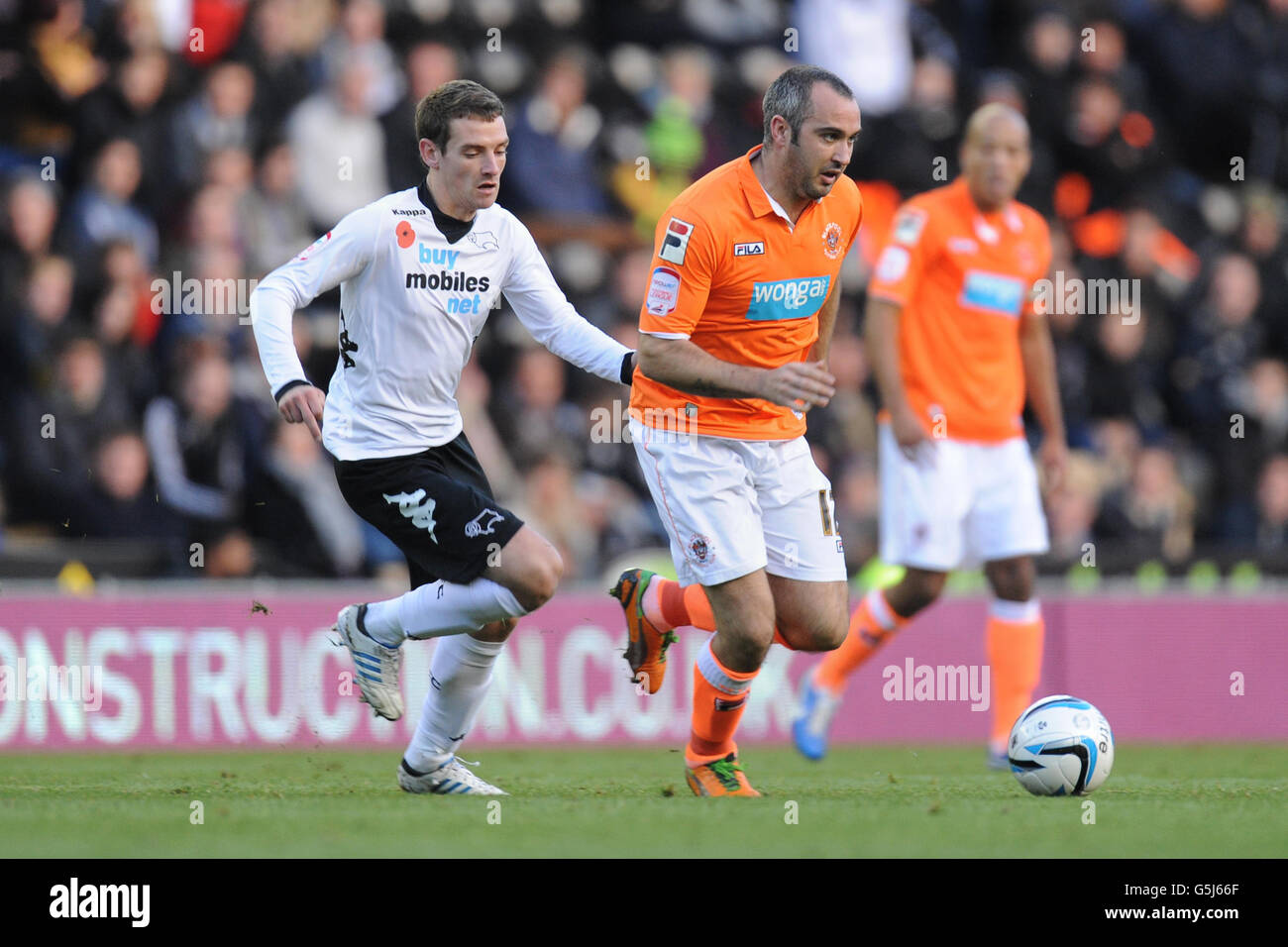 Derby County's Craig Bryson (left) and Blackpool's Gary Taylor-Fletcher ...