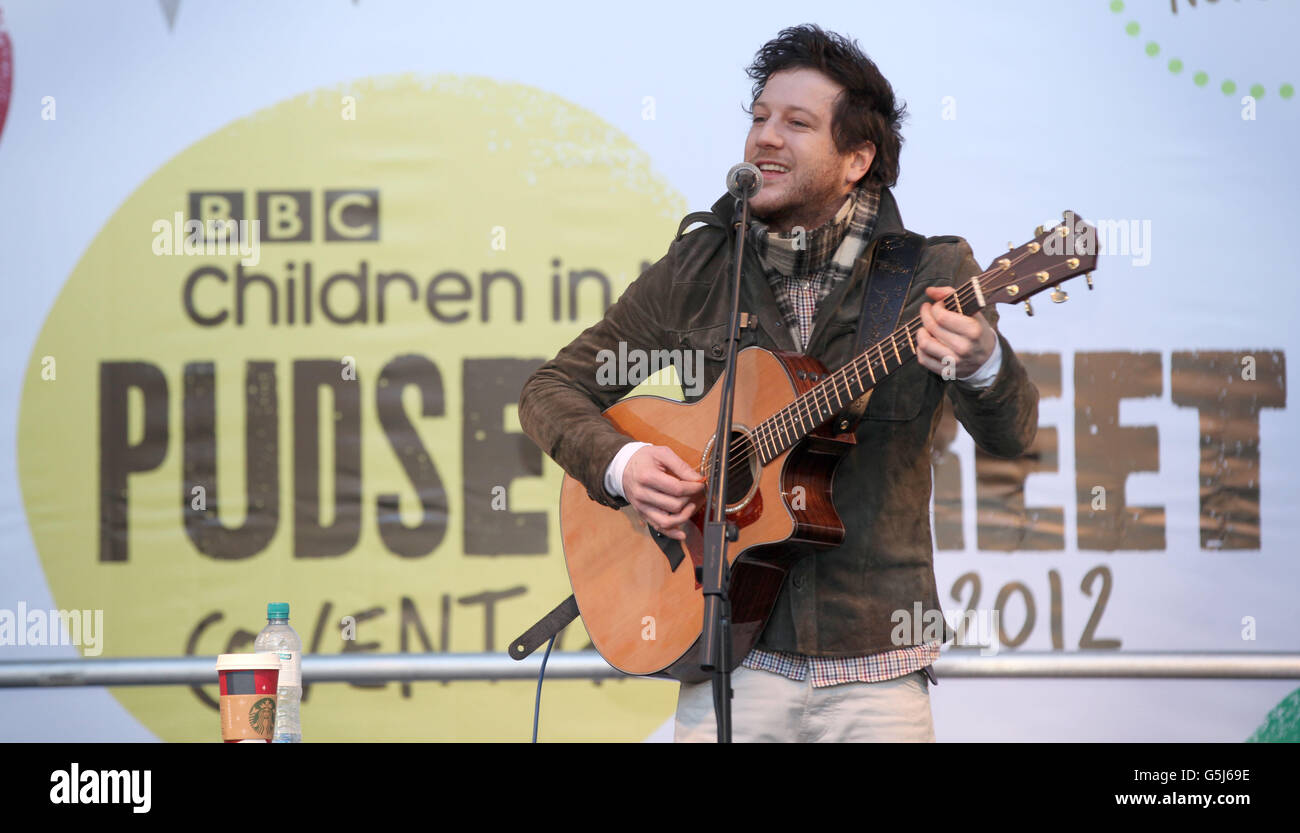 Matt Cardle performs a live busking session at the Pudsey Street event ...
