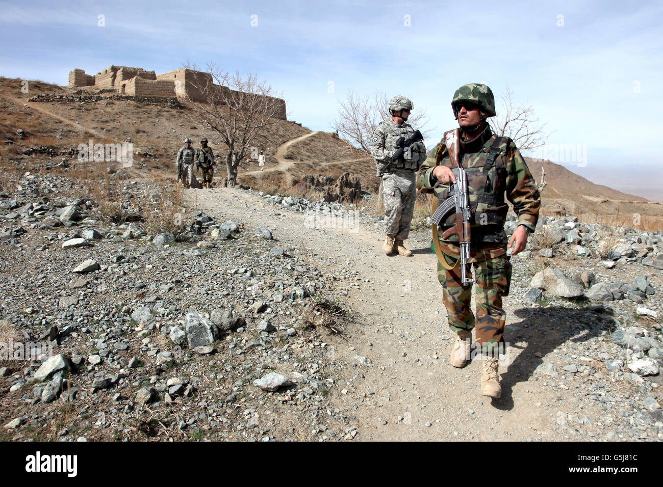 Us soldiers patrol village hi-res stock photography and images - Alamy