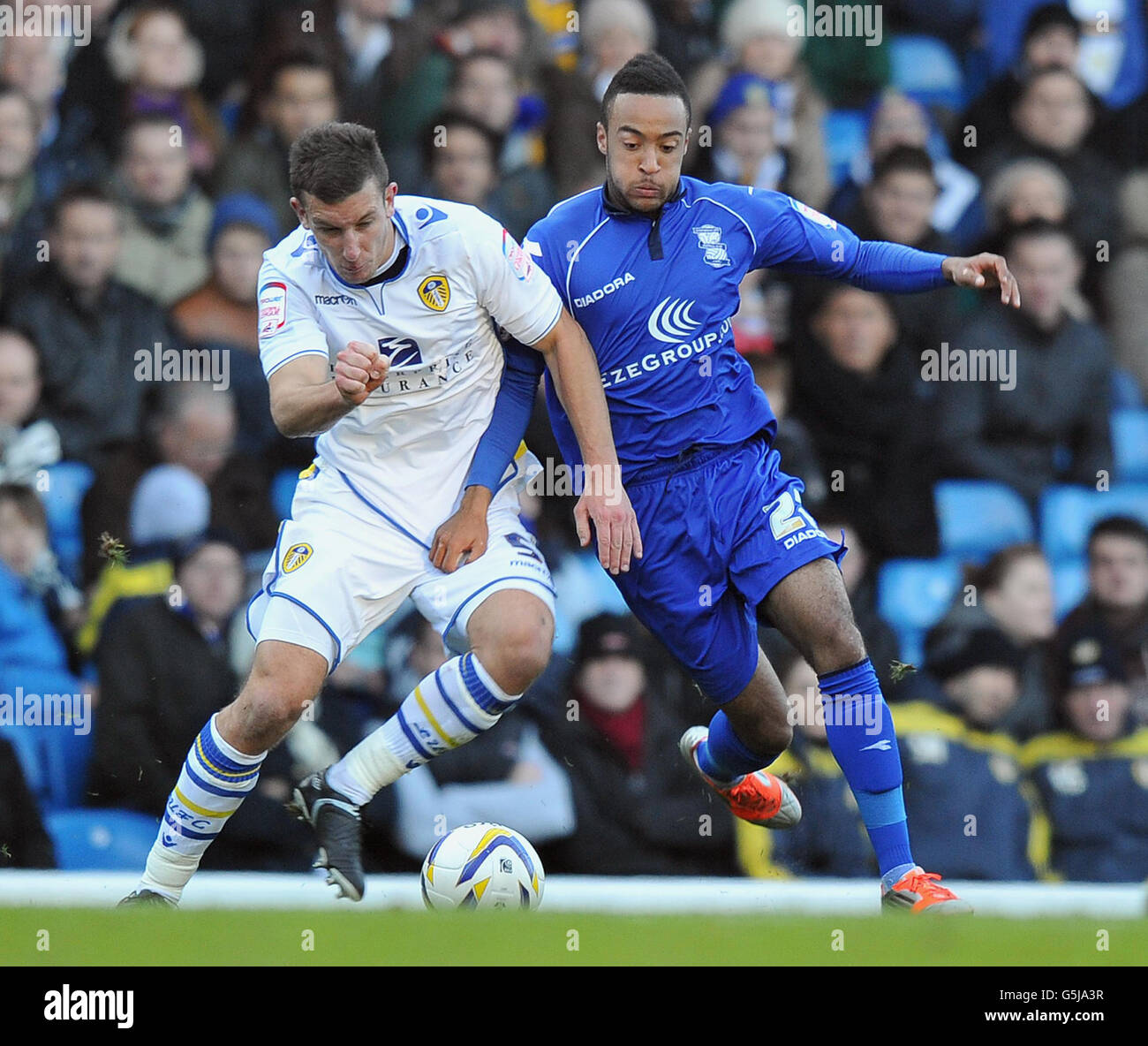 Birmingham City's Nathan Redmond and Leeds United's Jason Pearce (left ...