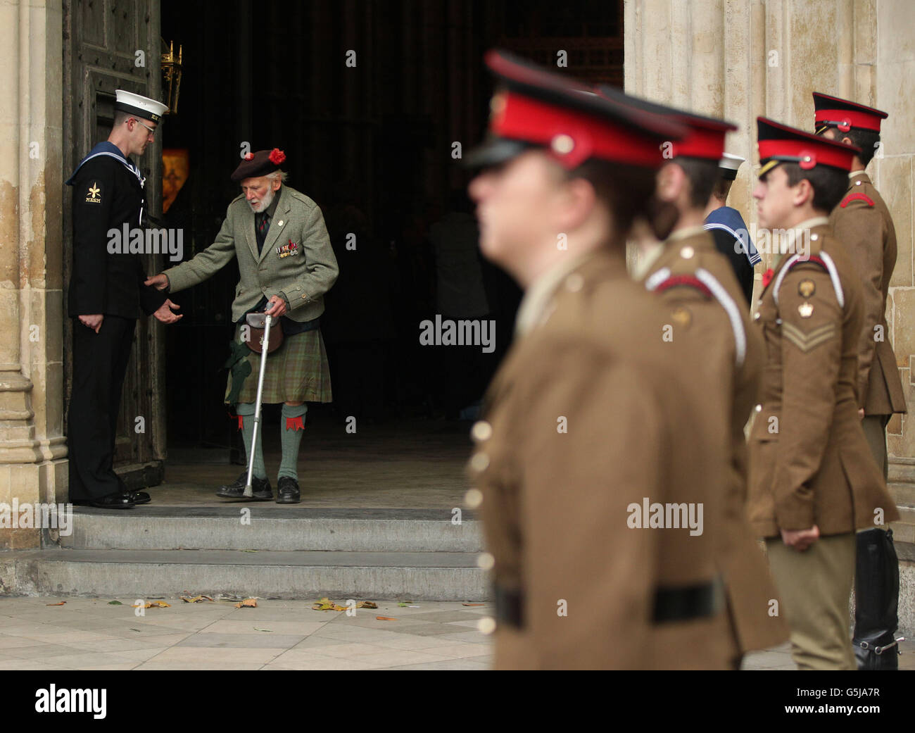 Veteran Major Peter Watson MC (2nd left) of the Black Watch leaving a ...