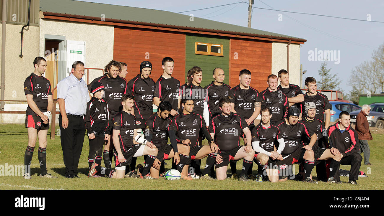 Biggar's players pose for a team photograph outside their new clubhouse ...