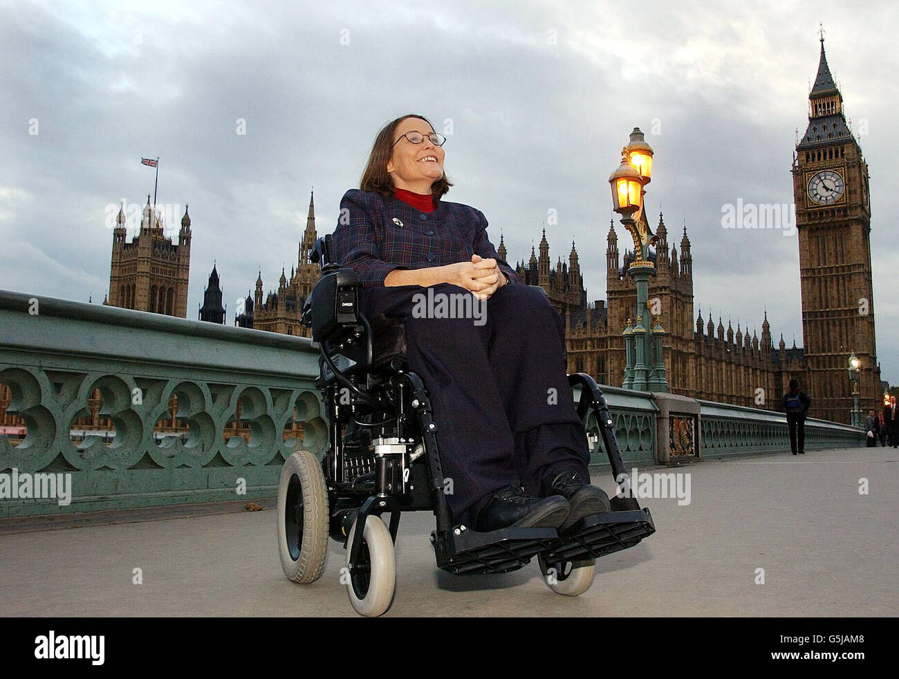 Ann Begg MP, with her new wheelchair, outside the Houses of Parliament ...
