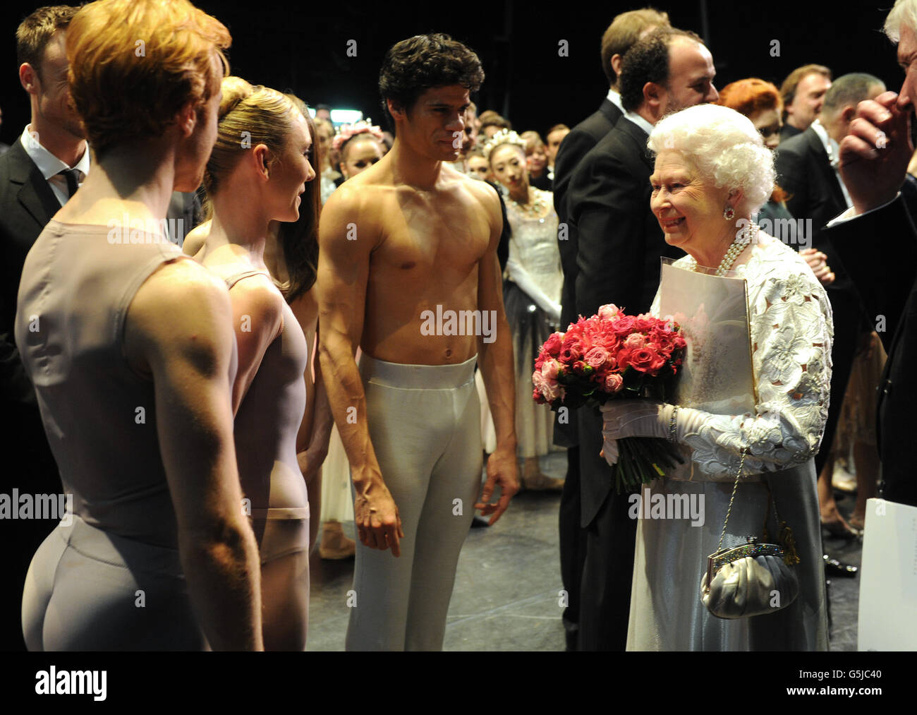 Queen Elizabeth II meets members of the cast and crew following a Gala ...