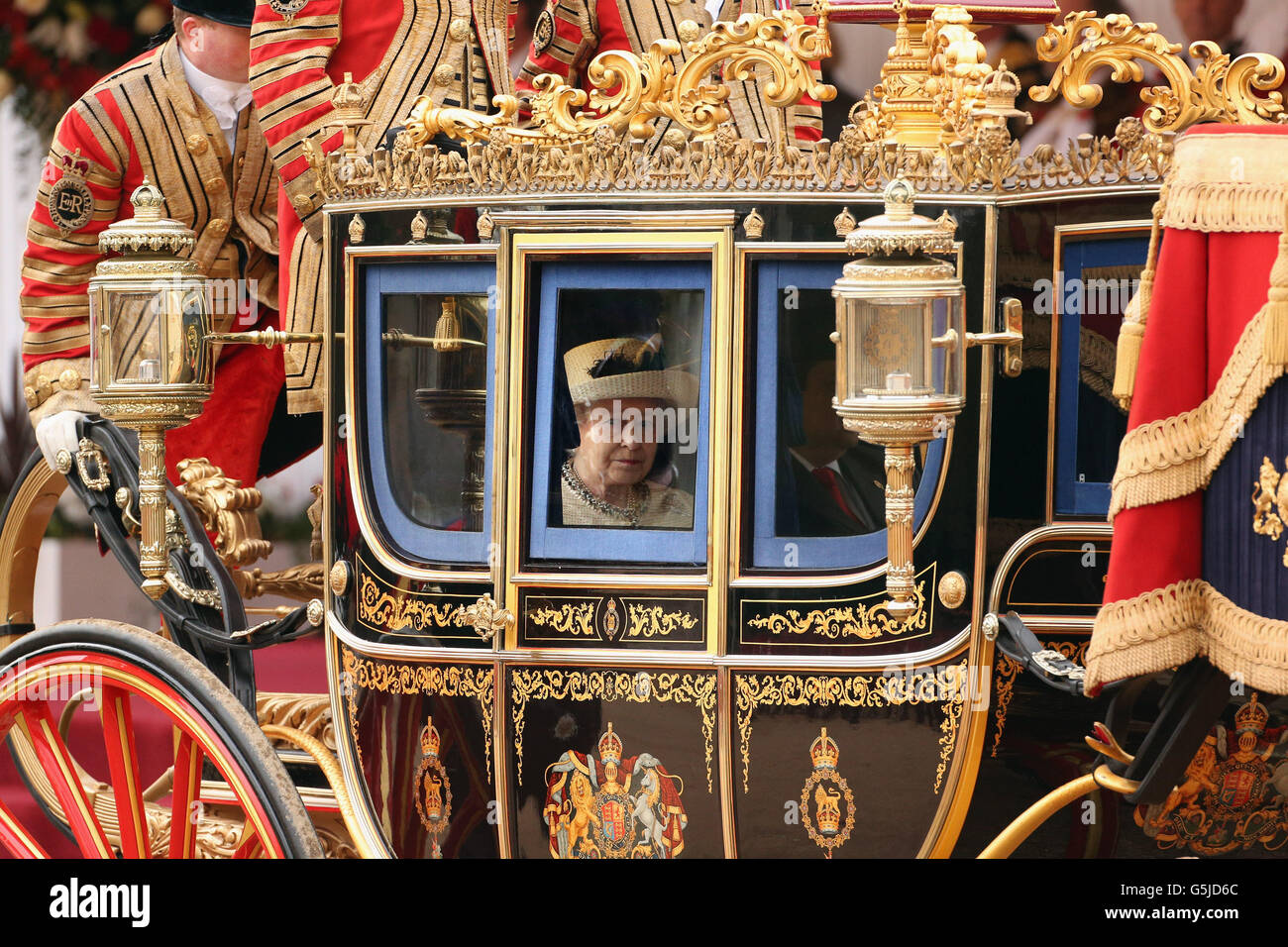 Queen Elizabeth II leaves in the Irish State Coach following a ...