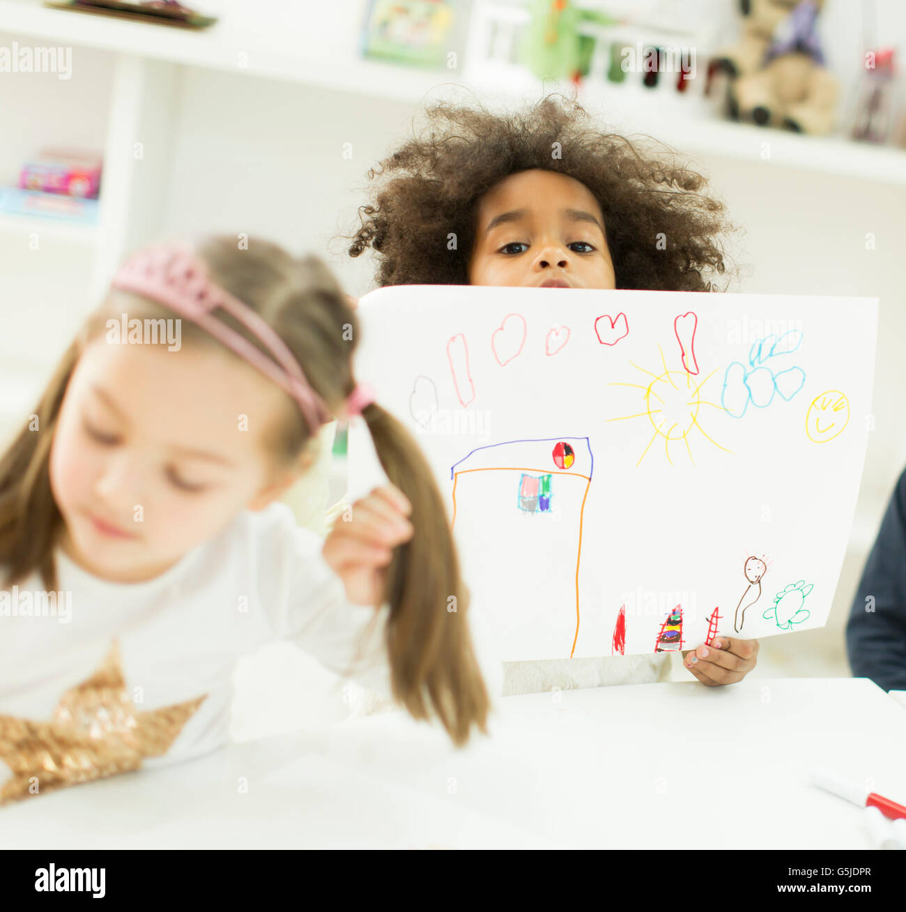 Little girls playing and learning in the kindergarten Stock Photo - Alamy