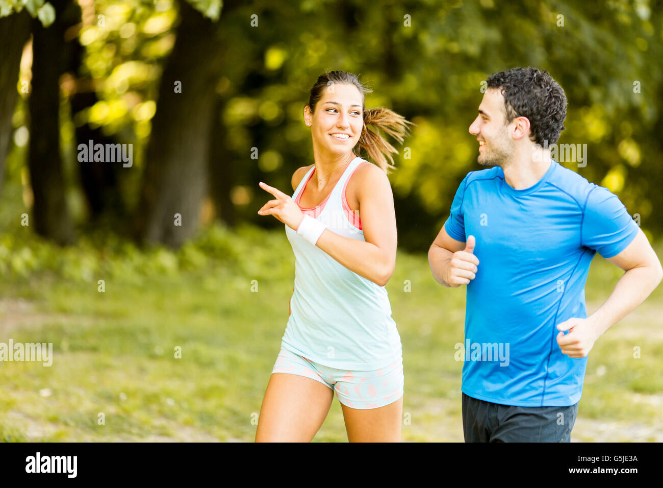 Couple running hi-res stock photography and images - Alamy