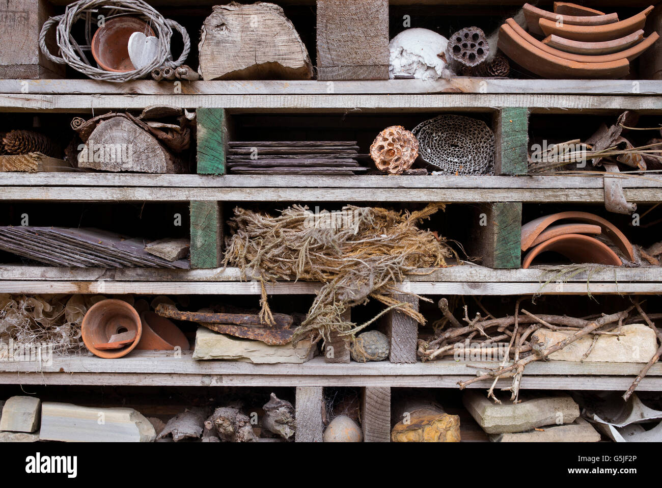 Insect home made using old wooden pallets for encouraging insects ...