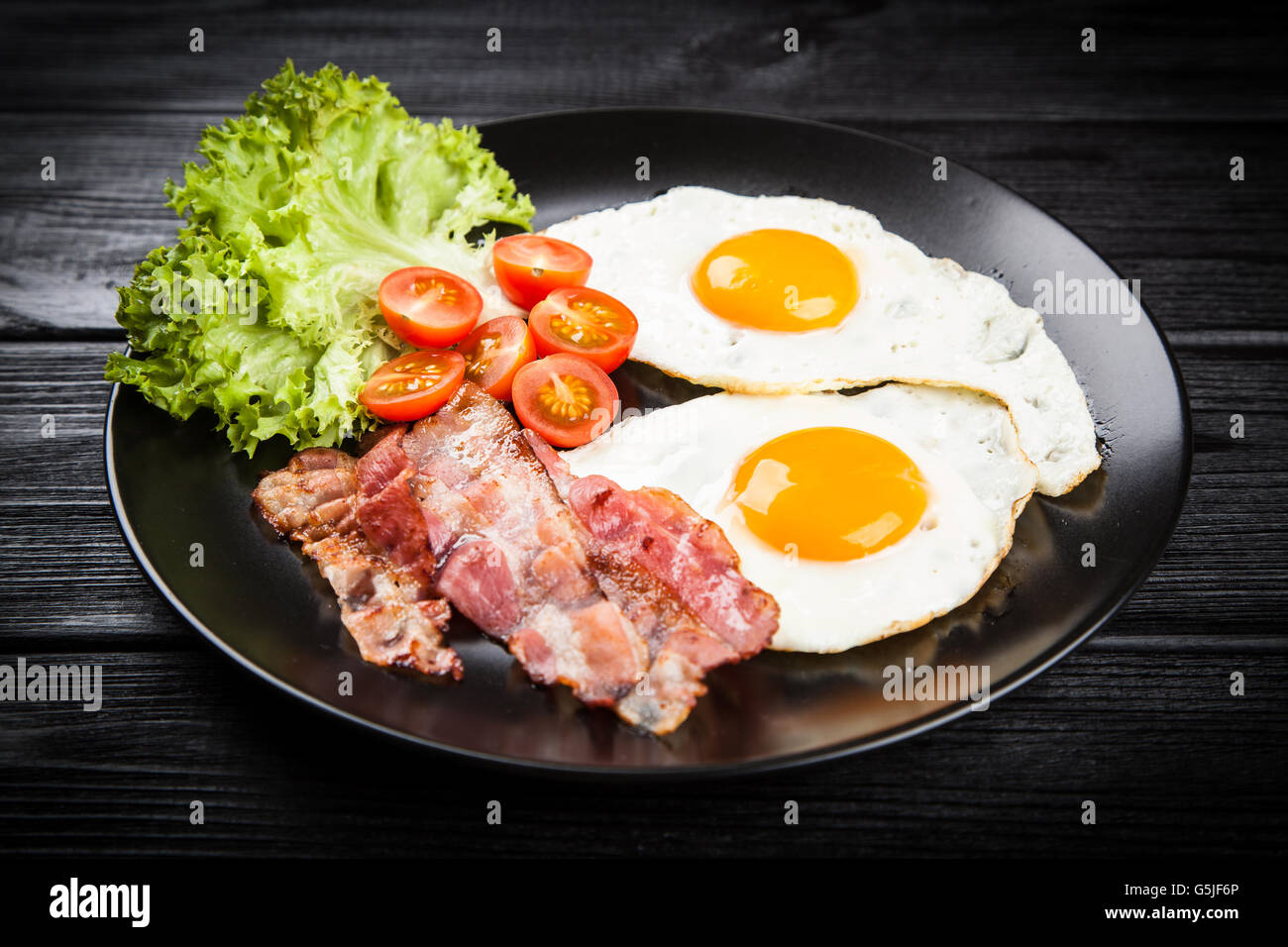 Traditional breakfast on a plate Stock Photo - Alamy