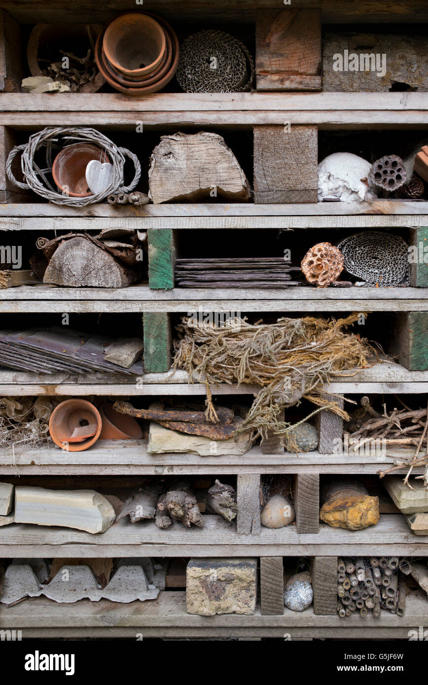 Insect home made using old wooden pallets for encouraging insects ...