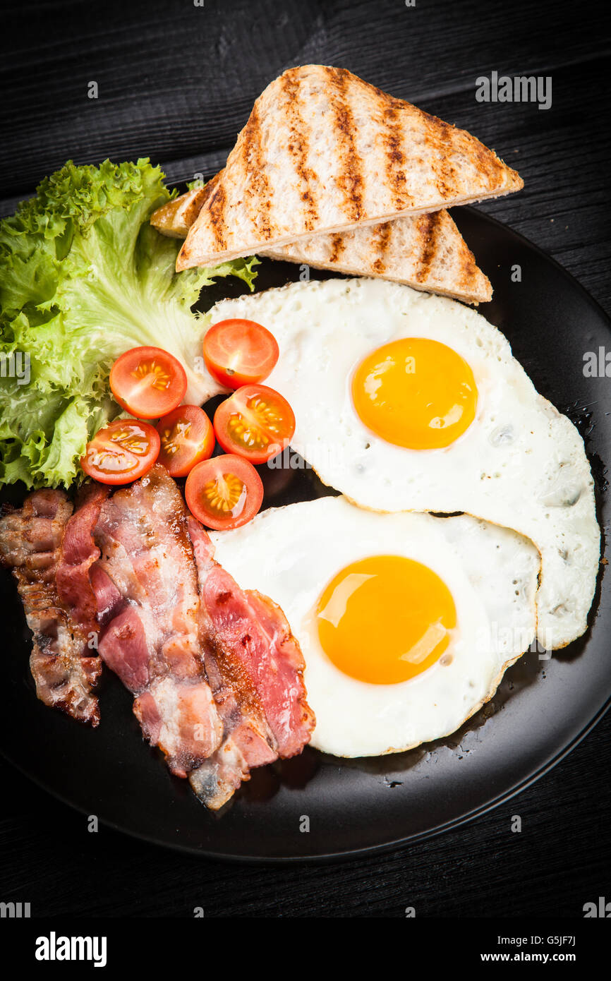 Traditional breakfast on a plate Stock Photo - Alamy