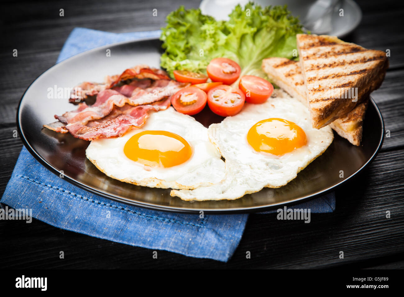 Traditional breakfast on a plate Stock Photo - Alamy