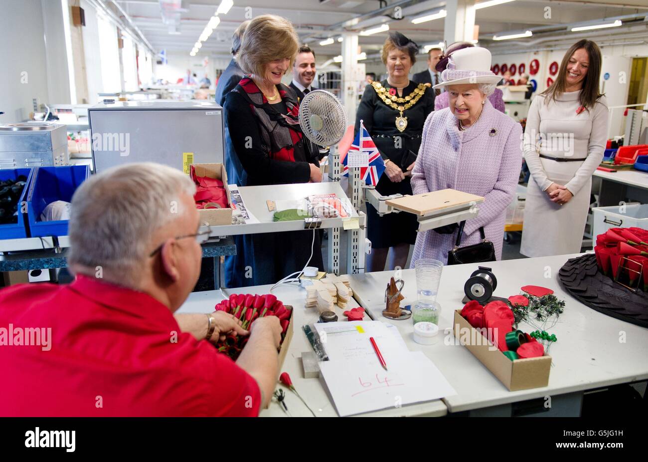 Queen visits Poppy Factory Stock Photo - Alamy