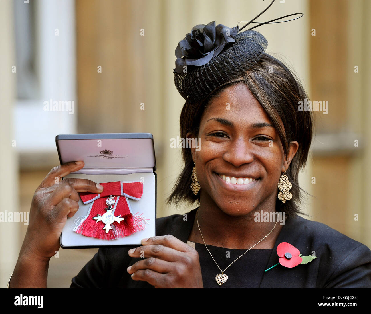 Proudly holds his mbe member of the british empire hi-res stock ...
