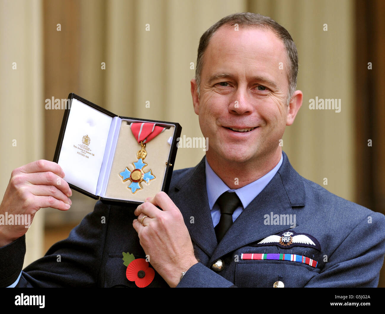 Investiture ceremony at Buckingham Palace Stock Photo - Alamy