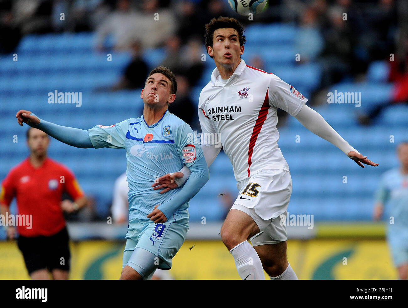 Coventry City's Cody McDonald (left) and Scunthorpe United's Niall ...