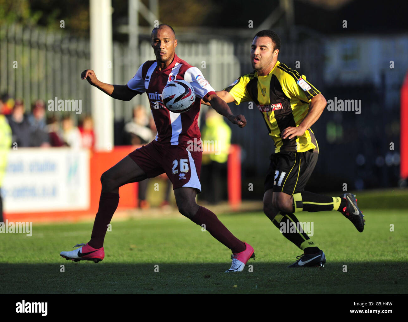 Cheltenham Town's Chris Zebroski and Burton Albion's Marcus Holness ...